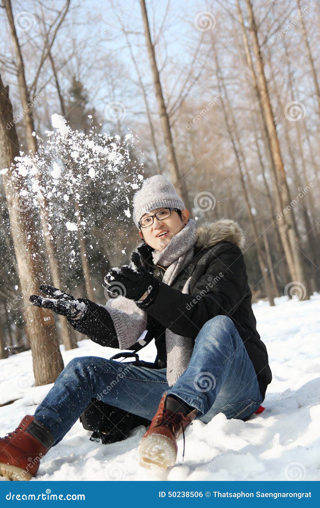 Asian Handsome Guy Throwing Snow in the Air in Garden Stock Photo ...