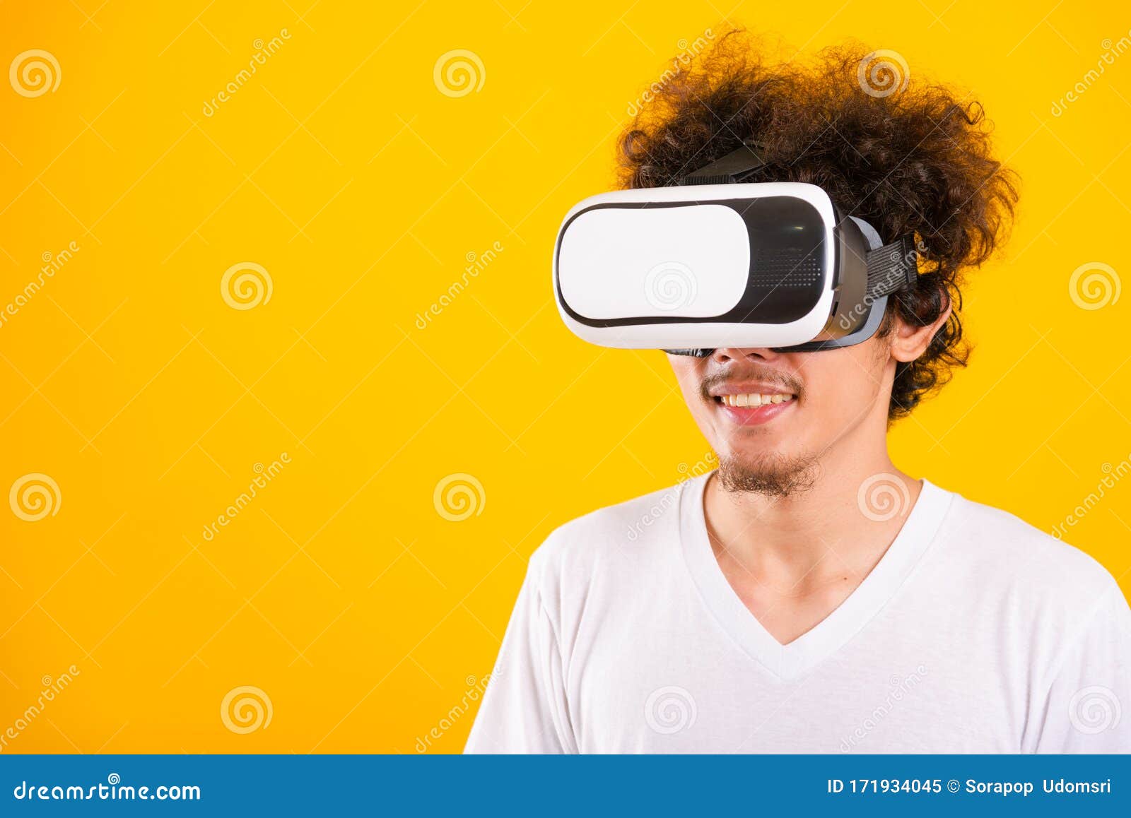 Asian Handsome Man with Curly Hair he Using Virtual Reality Headset or ...