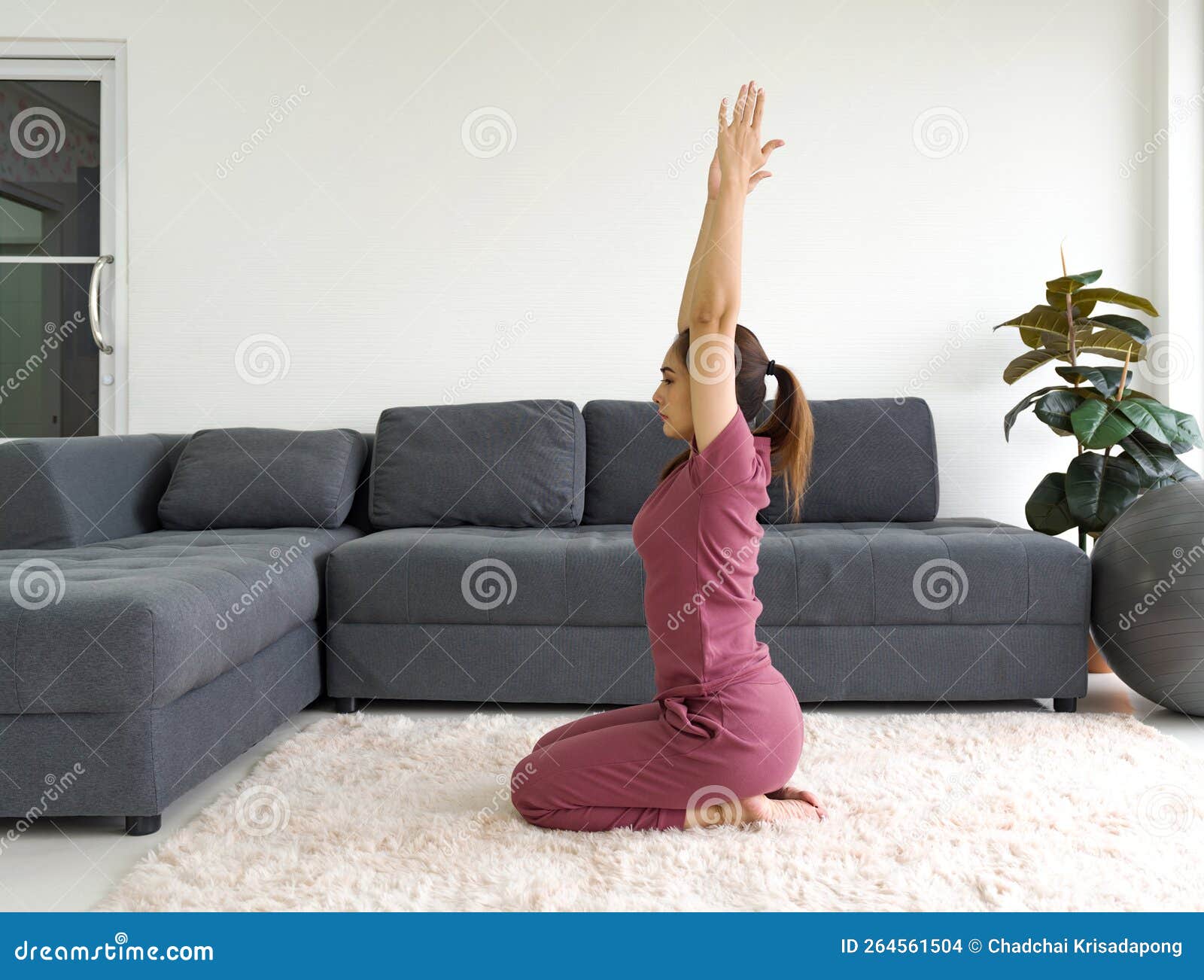 Asian Housewife Doing The Diamond Pose Exercise During Home Workout