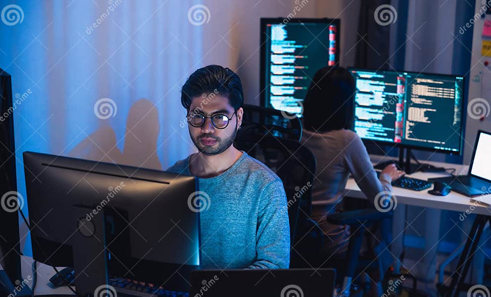 Asian and Indian Developer Devops Team Working about Coding Promgram with Software Computer at ...