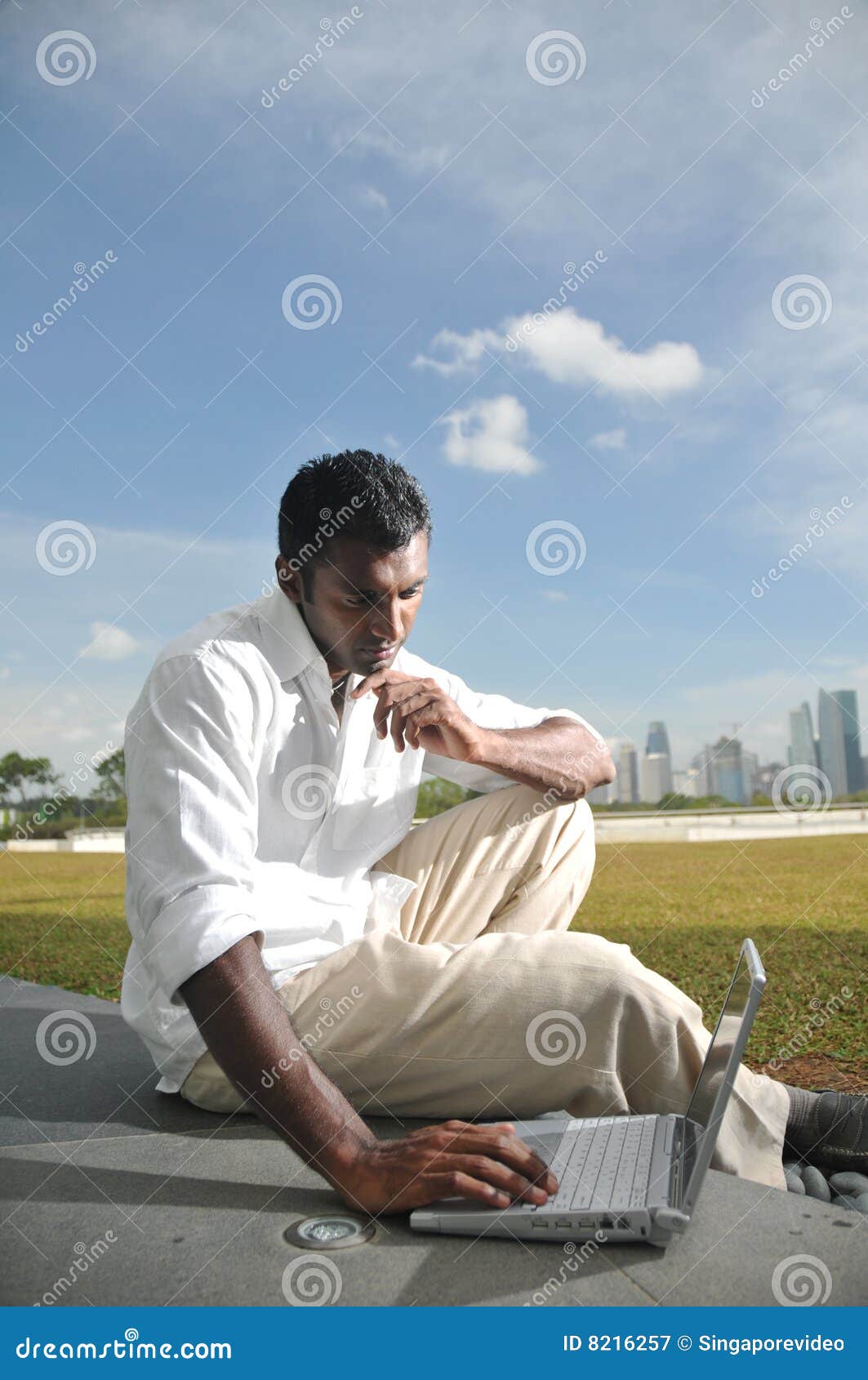Asian Indian Man Surfing the Internet Wirelessly Stock Image - Image of ...
