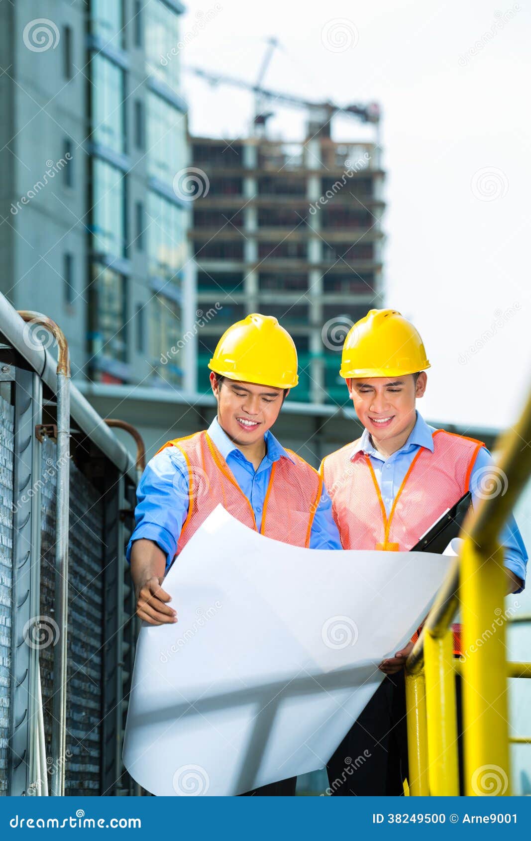 Asian Indonesian Construction Workers on Building Site Stock Photo ...