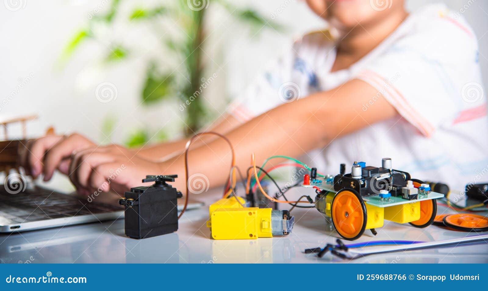 Asian Kid Boy Learns Coding and Programming with Laptop for Arduino Robot Car Stock Photo ...