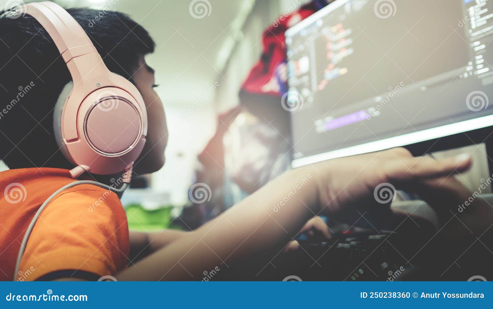 Asian Kid Coding and Scripting Program on on His Game Streaming Desktop ...