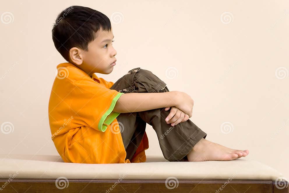 Asian kid contemplating stock photo. Image of contemplate - 7073570