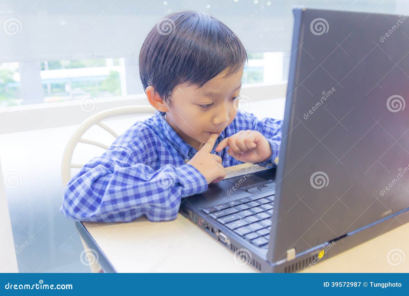 Asian kid with laptop stock image. Image of network, bright - 39572987