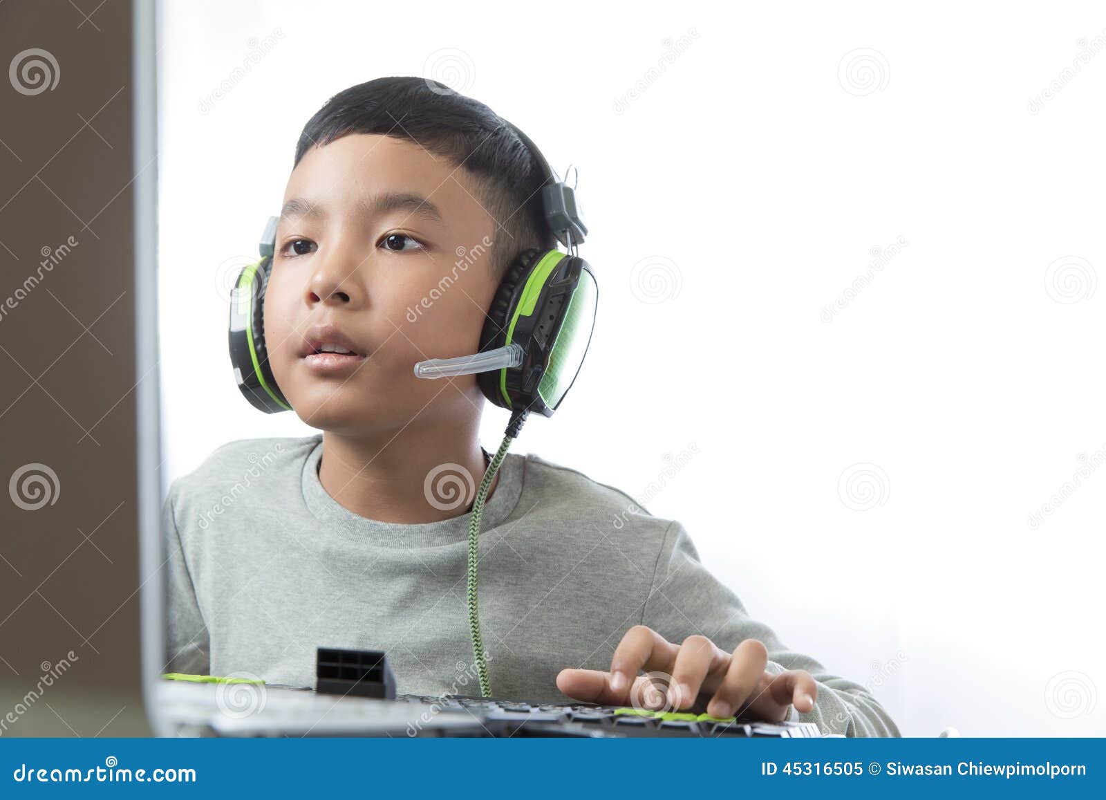 Asian Kid Play Computer Games Stock Image - Image of cheerful, kids ...