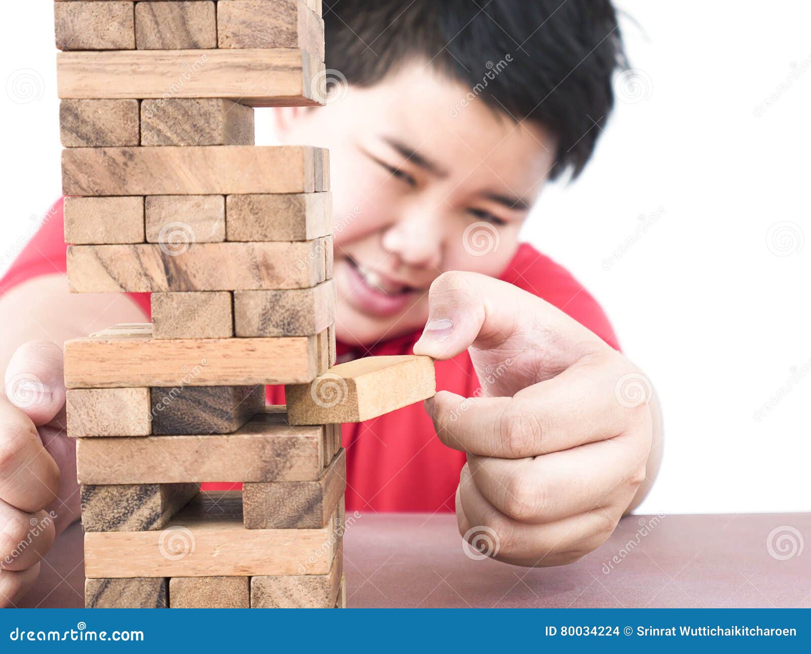 Asian Kid is Playing a Wood Blocks Tower Game Stock Photo - Image of ...