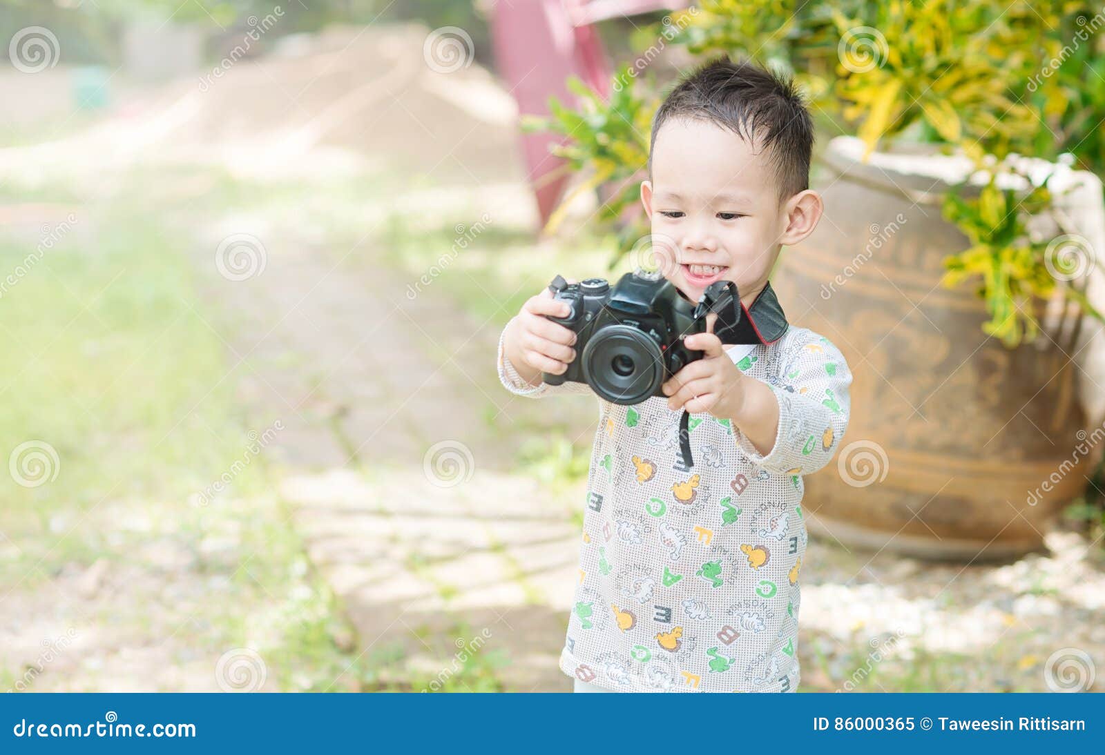 Asian Kid Take a Photo by DSLR Camera Stock Image - Image of ...