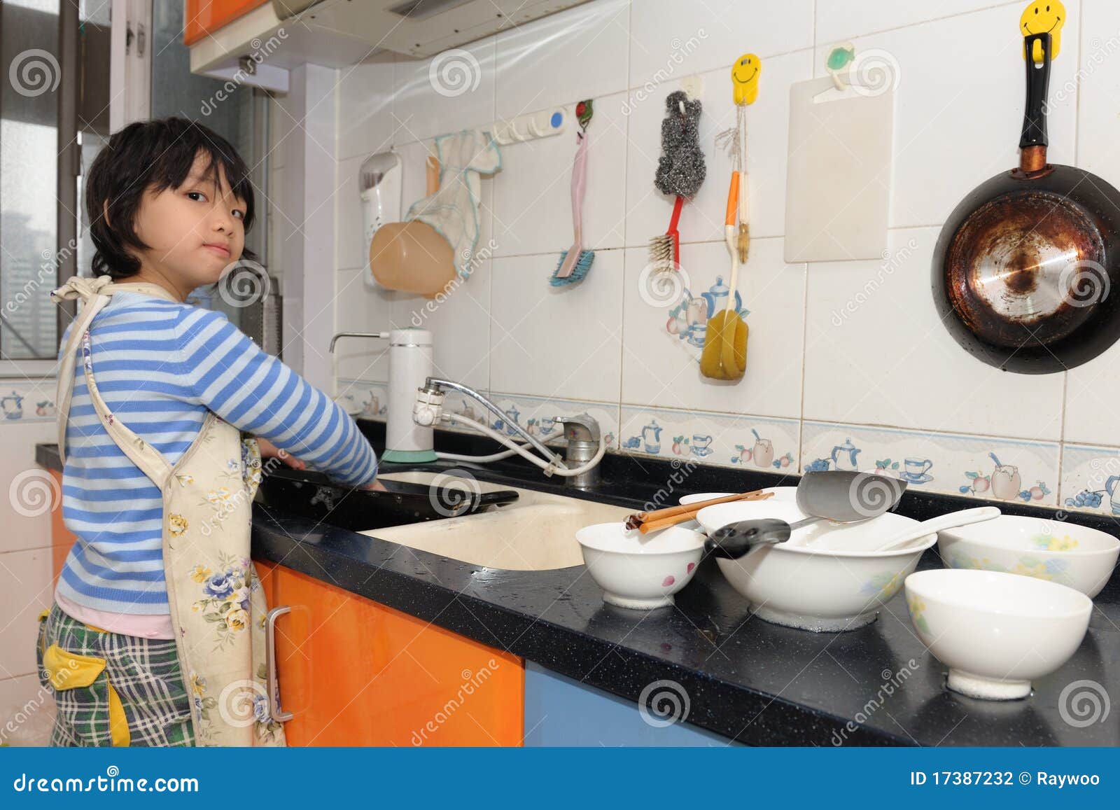 Asian kid washing dishes stock photo. Image of bowl, chores - 17387232
