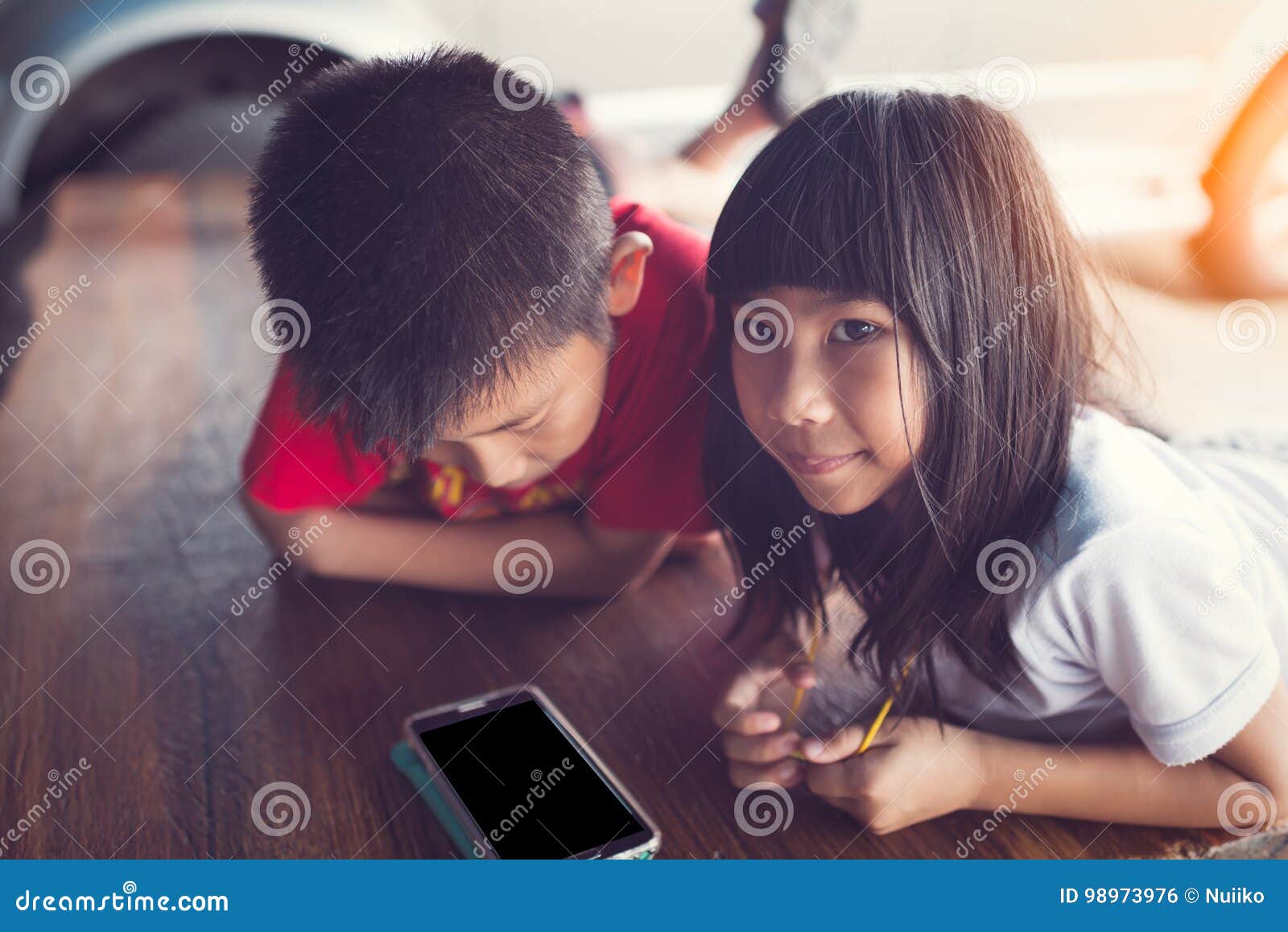 Asian Kids Using Smartphone Together. Stock Photo - Image of cheerful ...