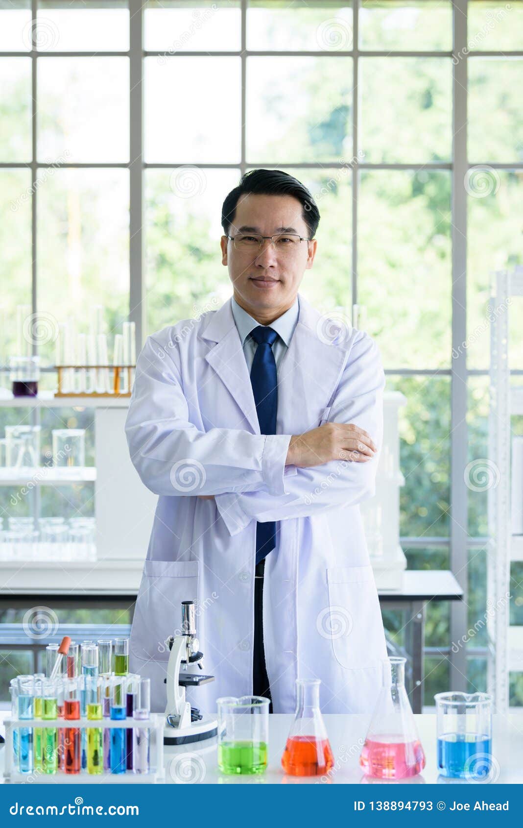 Asian Laboratory Scientist Man Working at Lab with Test Tubes Stock ...
