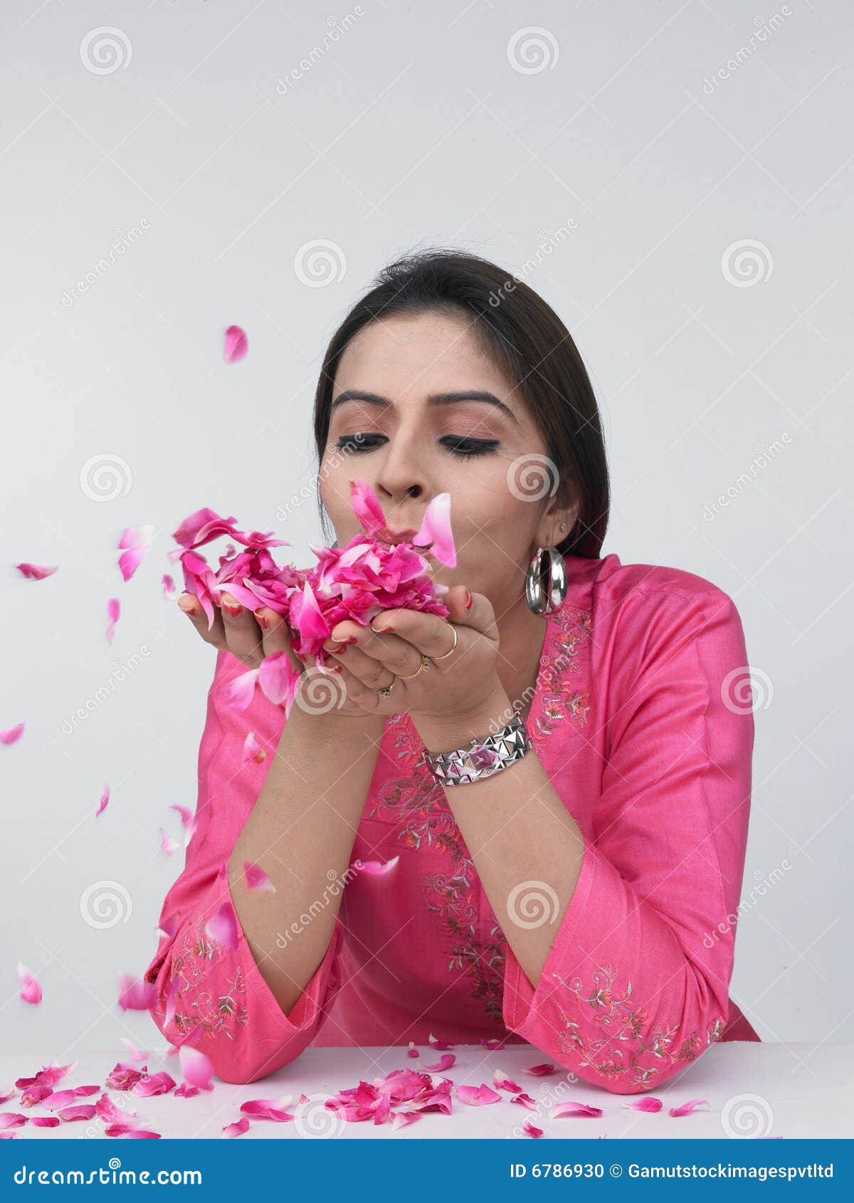 Asian Lady with Rose Petals in Her Palm Stock Photo - Image of sleeve ...