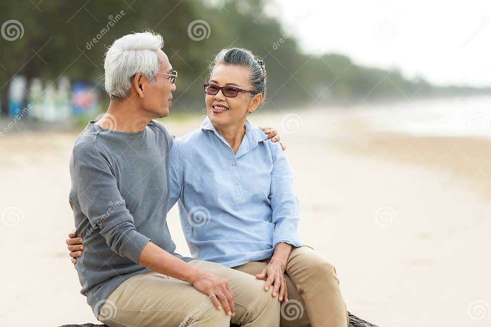 Asian Lifestyle Elderly Couple Romantic Lover Hug And Sitting On The