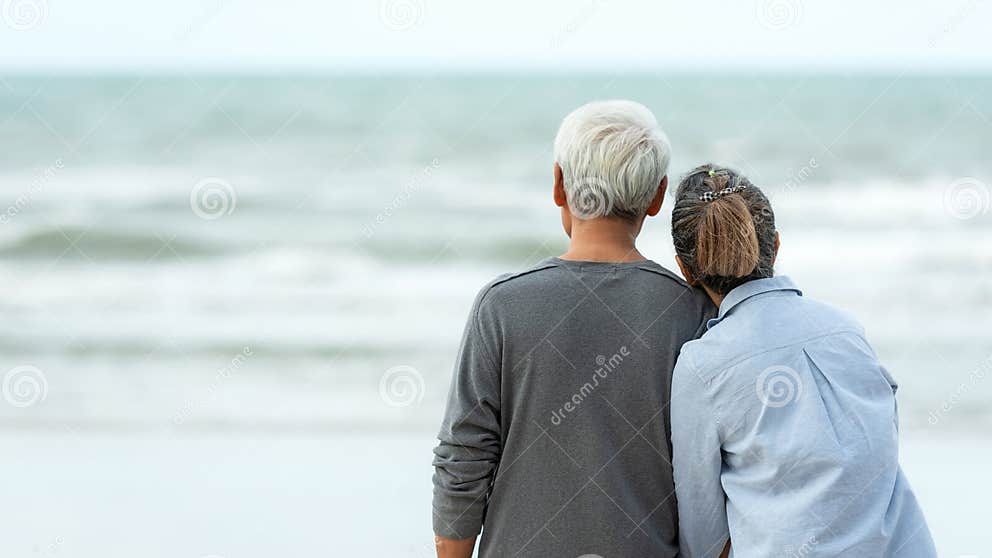 Asian Lifestyle Senior Couple Hug On The Beach Happy In Love Romantic