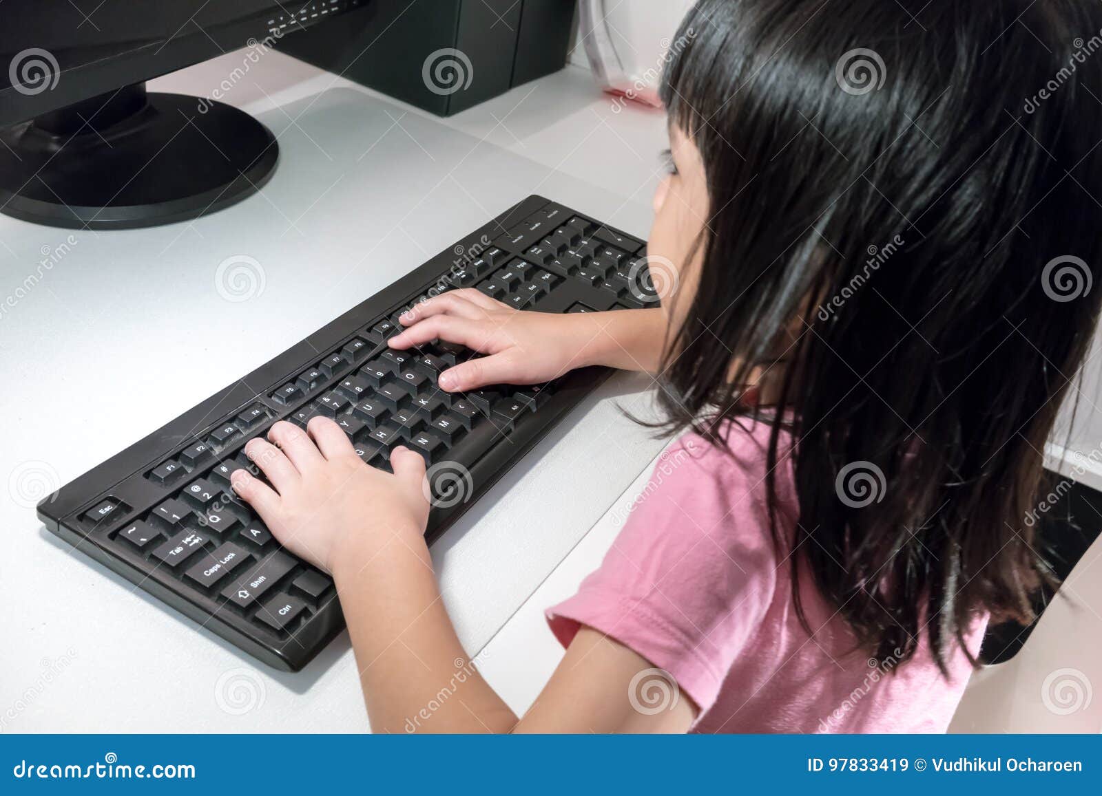 Asian Little Girl Practicing Computer Keyboard Typing Stock Image ...