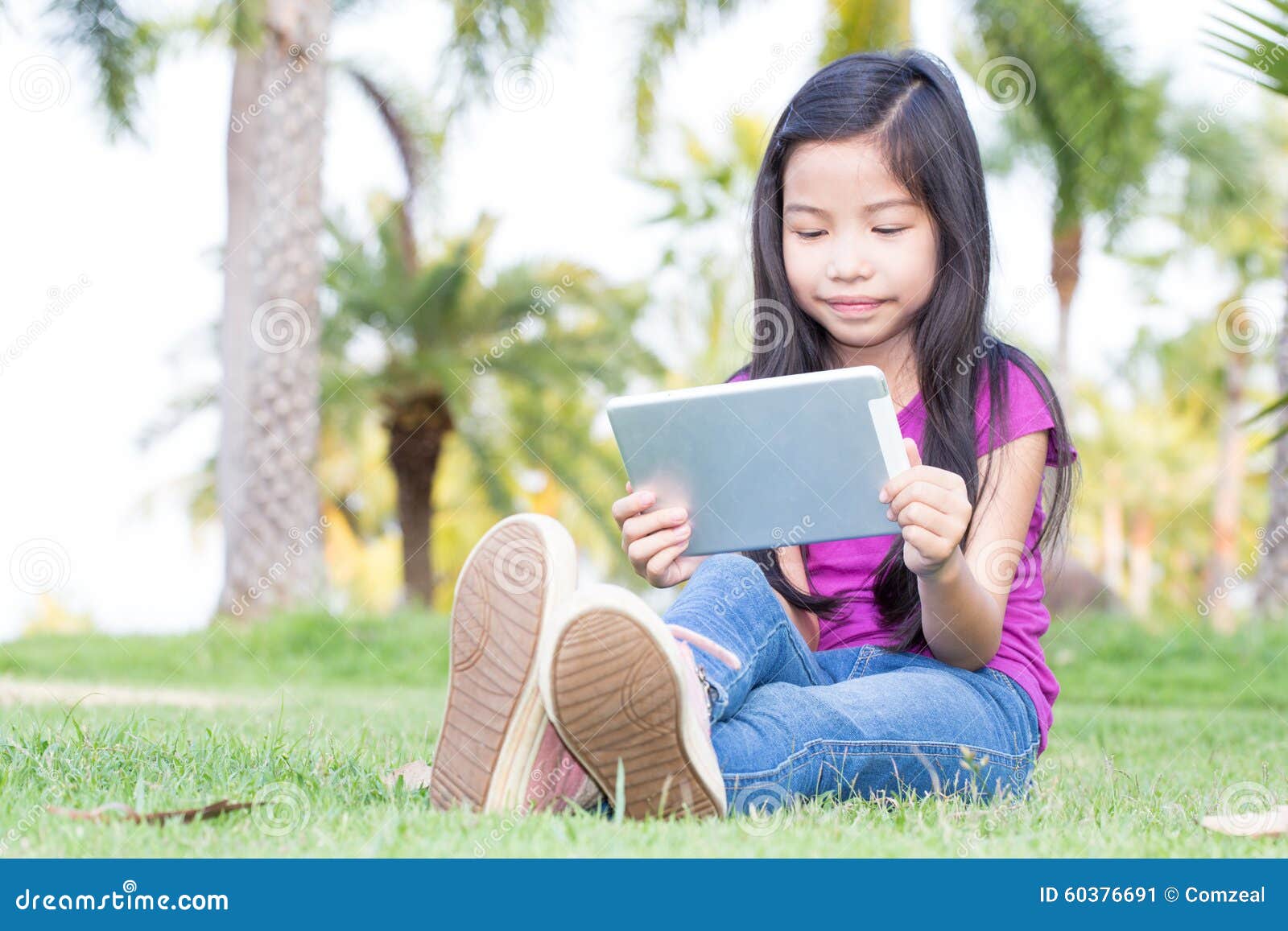 Asian Little Girl with a Tablet Stock Image - Image of leisure, little ...