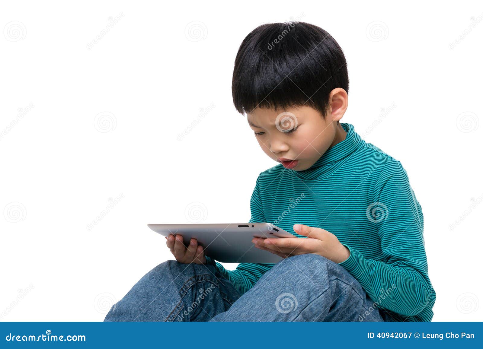 Asian Little Kid Concentrate on Reading Tablet Stock Image - Image of ...