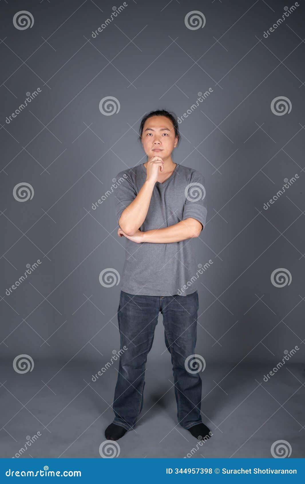 Asian Long Hair Friendly and Positive Man is Posting and Standing in ...