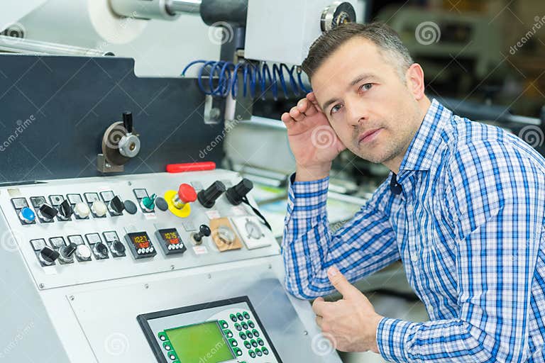 Asian Machine Operator in Production Plant Checking Data Stock Photo ...