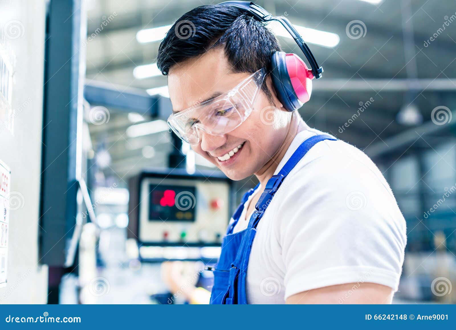 Asian Machine Operator in Production Plant Stock Photo - Image of ...