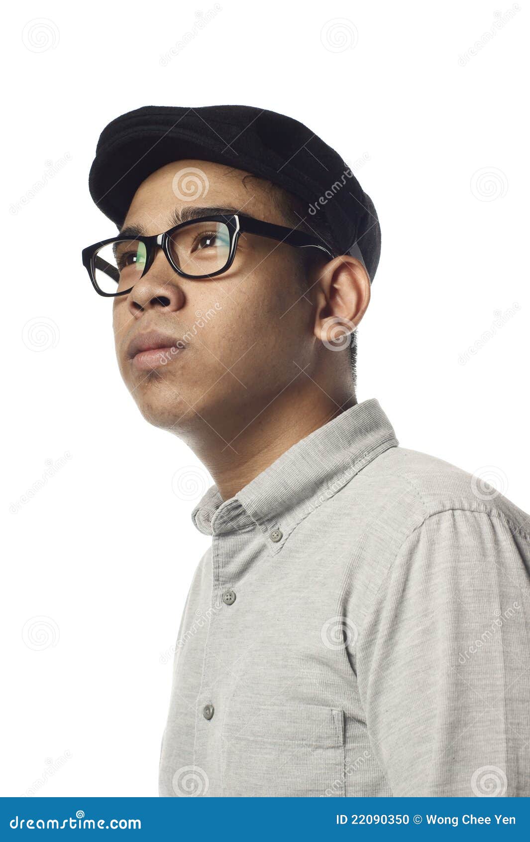 Asian Malay Man Smiling With A Puzzled Expression Stock Photography ...