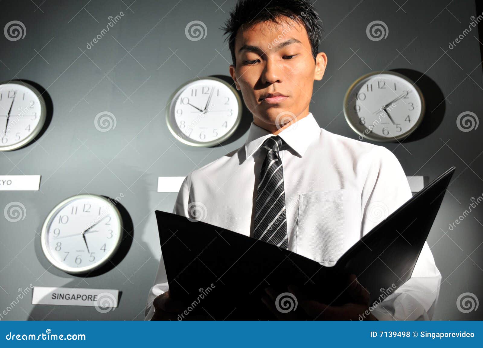 Asian Male Boss Scrutinizing Office Work Stock Photo - Image of ...