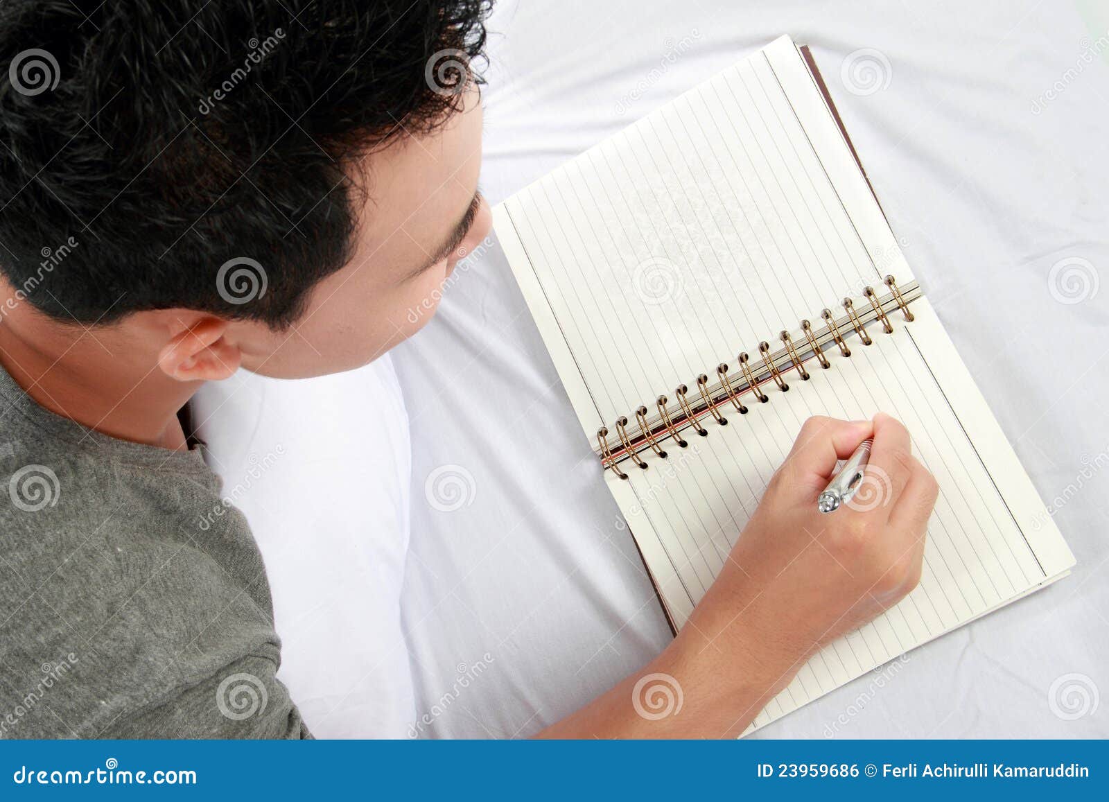 Asian male with his diary stock photo. Image of book - 23959686