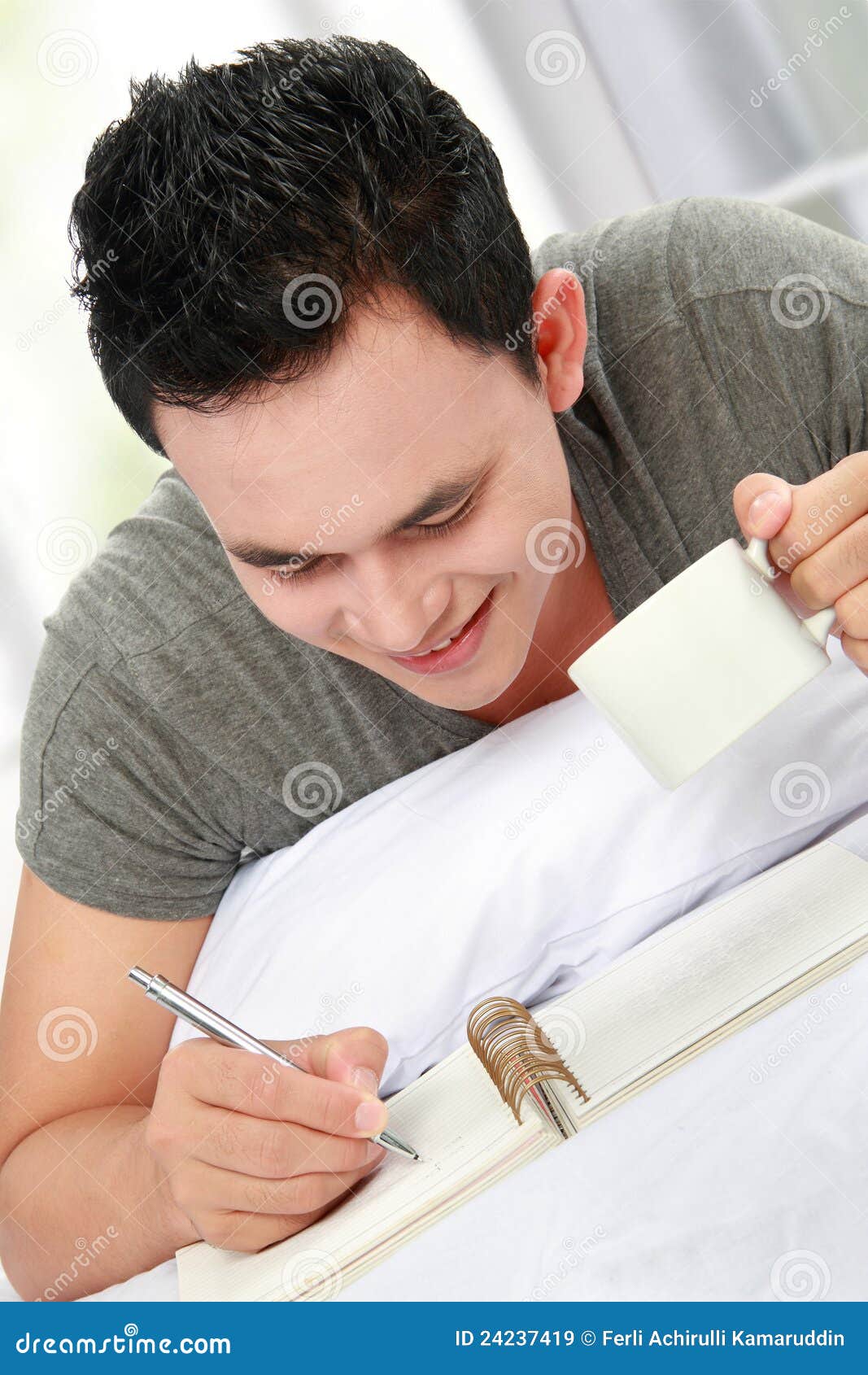 Asian male with his diary stock image. Image of personal - 24237419