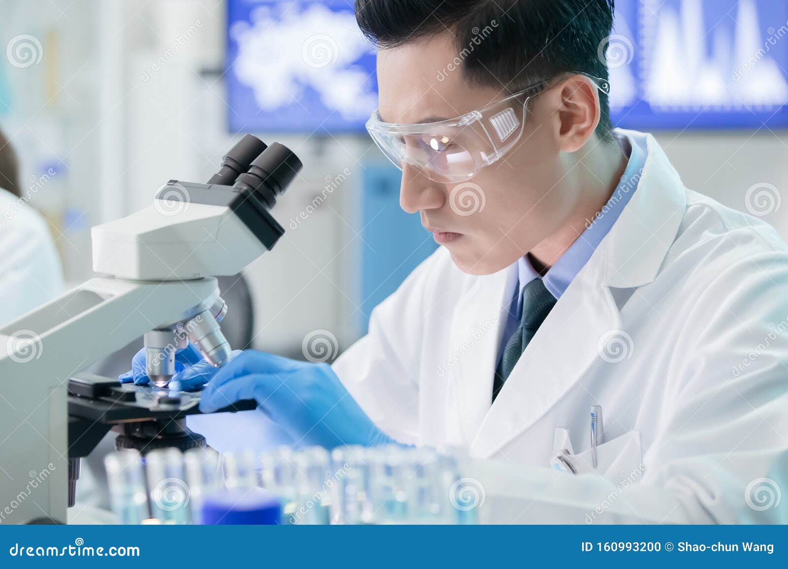 Asian Male Scientist Use Microscope Stock Photo - Image of medicine ...