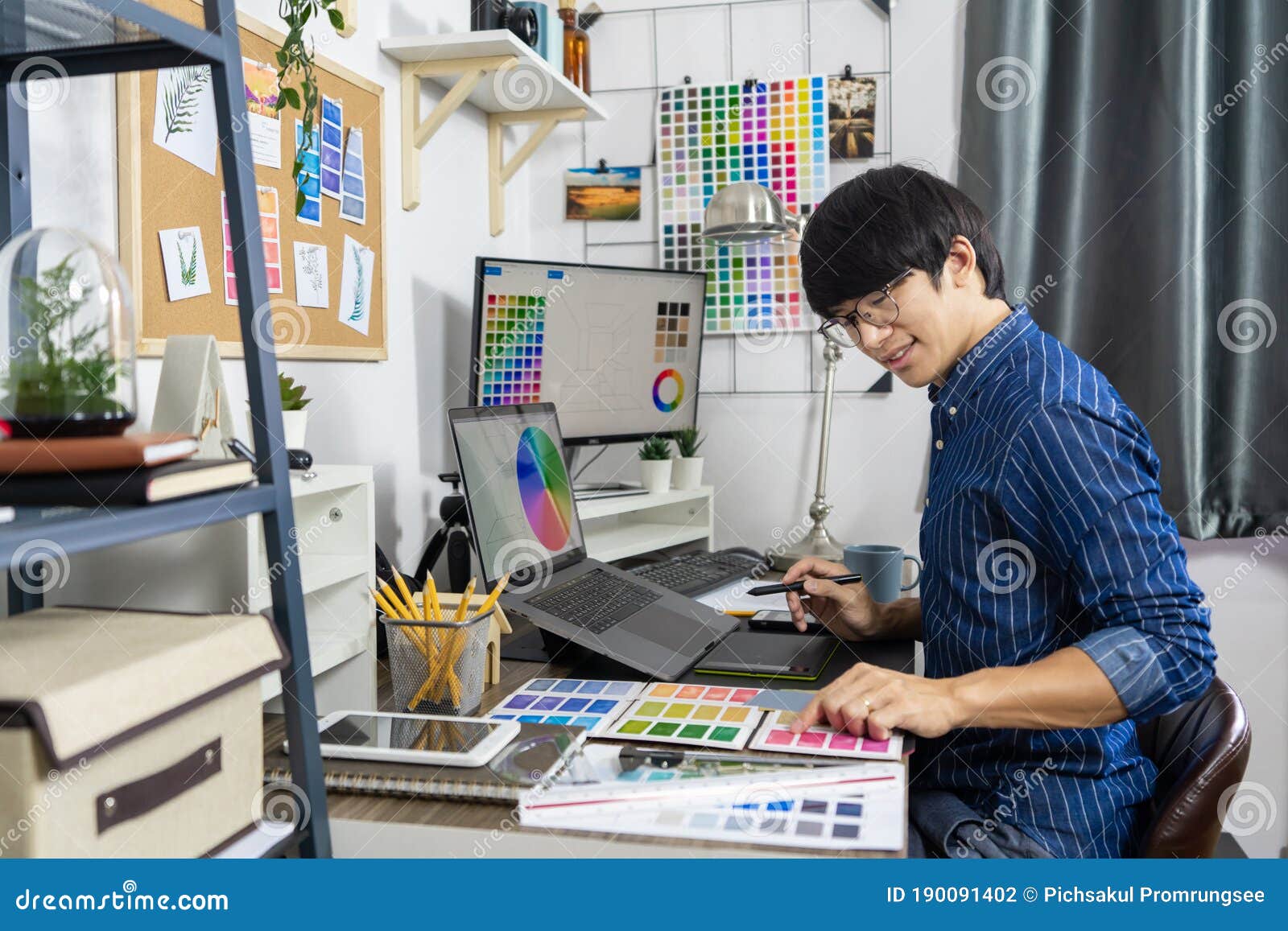 Asian Men Architect or Graphic Designer Designing a Layout Selection ...