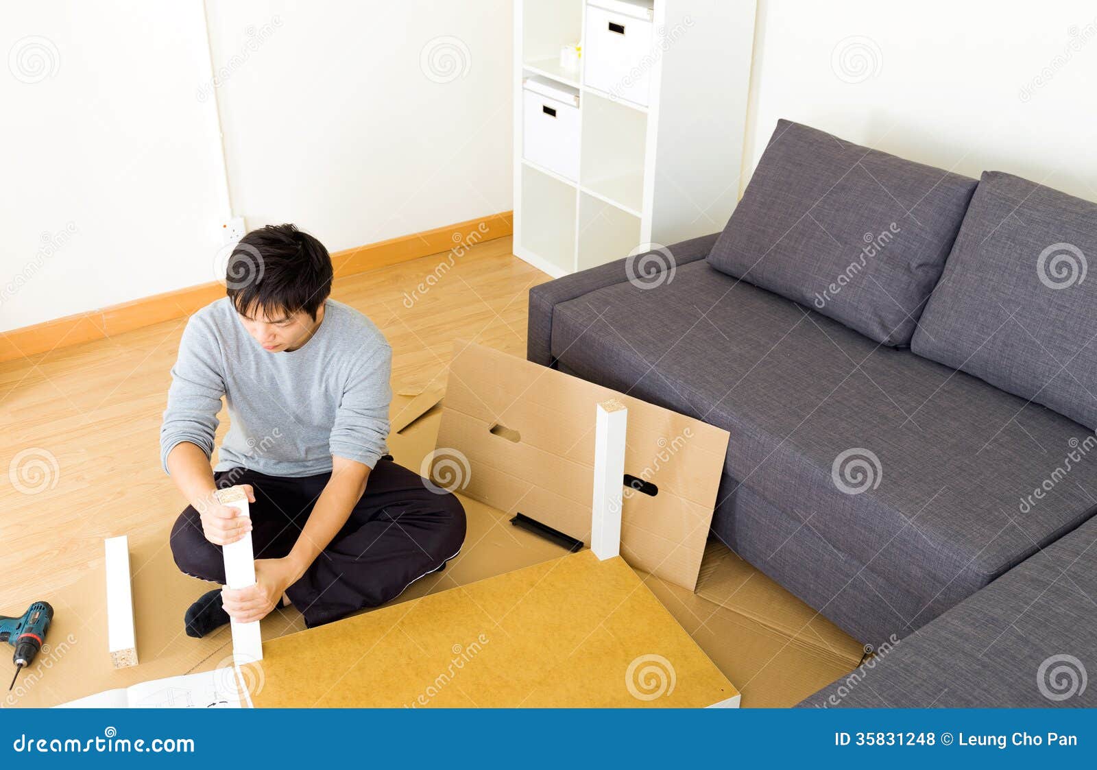 Asian man assembling table stock photo. Image of inlaying - 35831248