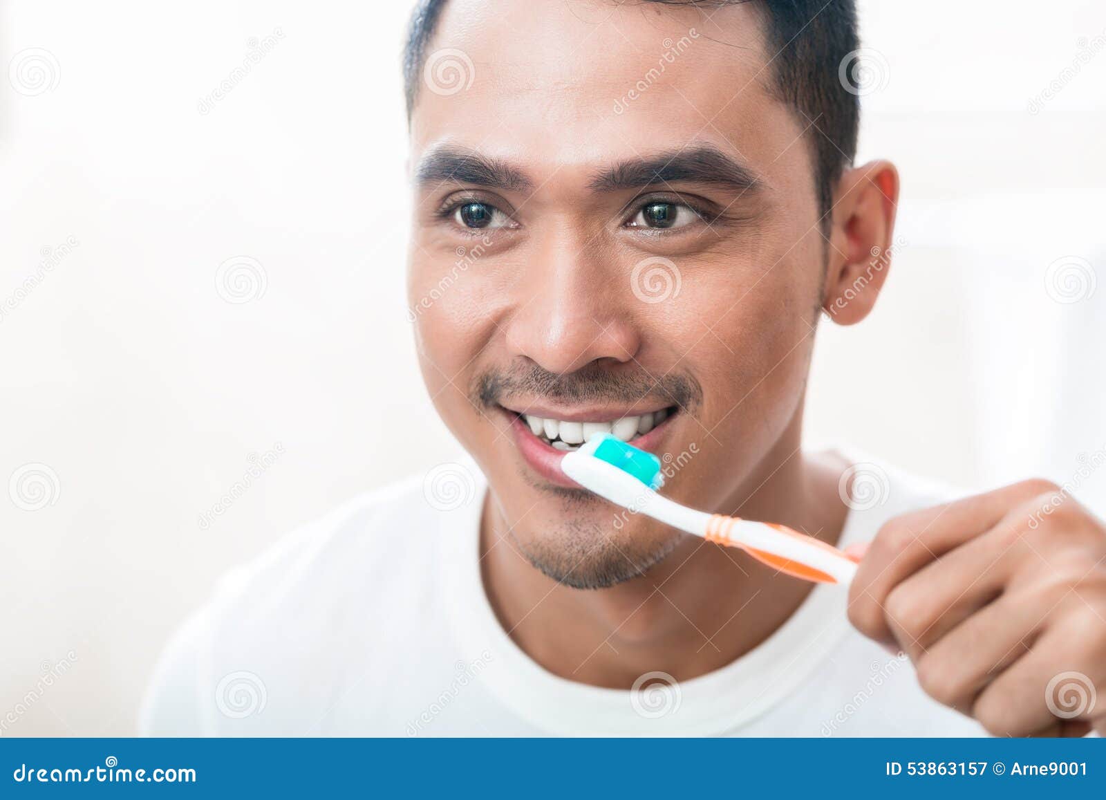 Asian man brushing teeth stock image. Image of teeth - 53863157