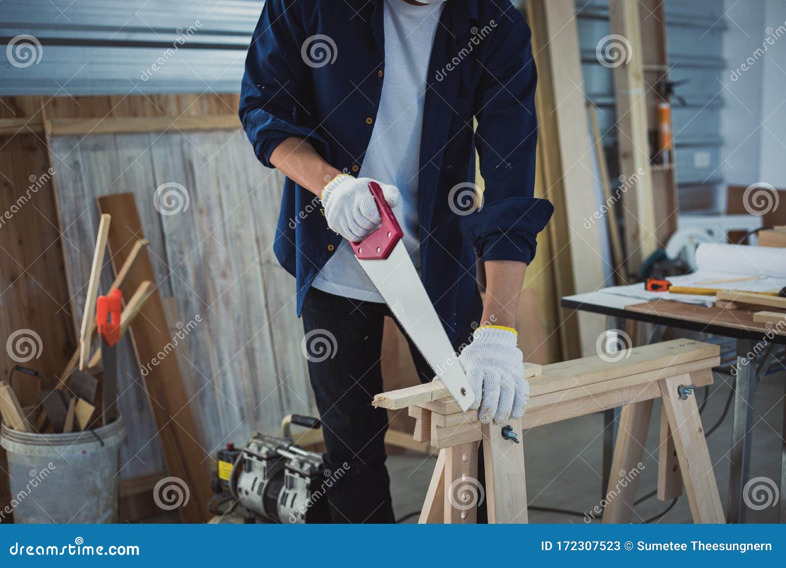 Asian Man Carpenter Working with Technical Drawing or Blueprint ...