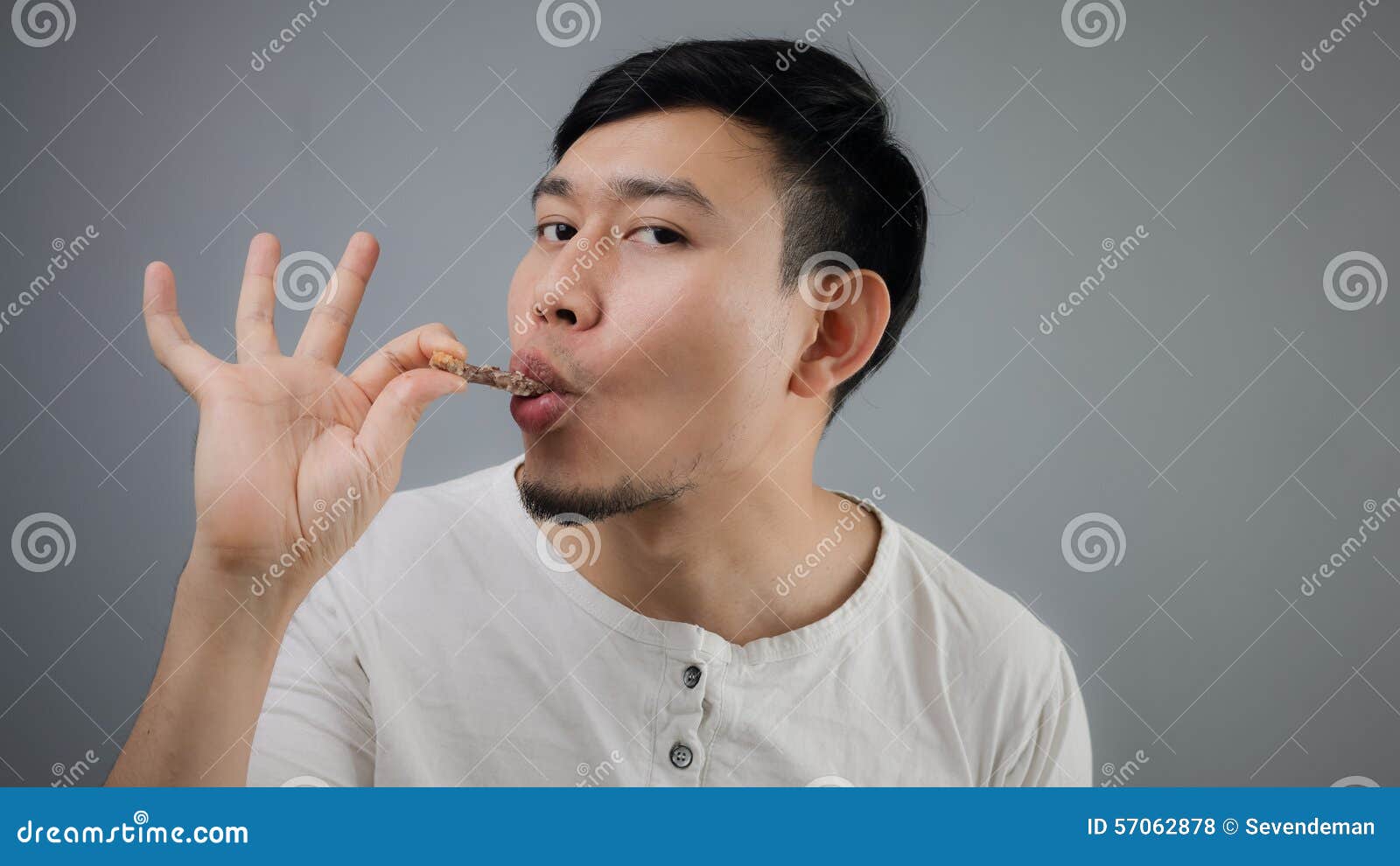 Asian Man with Chicken Bone. Stock Photo - Image of hungry, food: 57062878