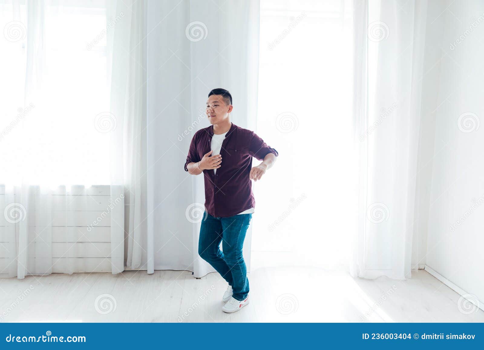 Asian Man Dancing To Music Alone at Home Stock Photo - Image of ...
