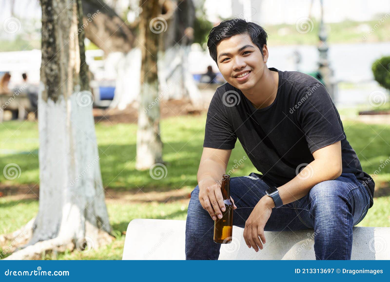 Asian man drinking beer stock image. Image of beer, confidence - 213313697