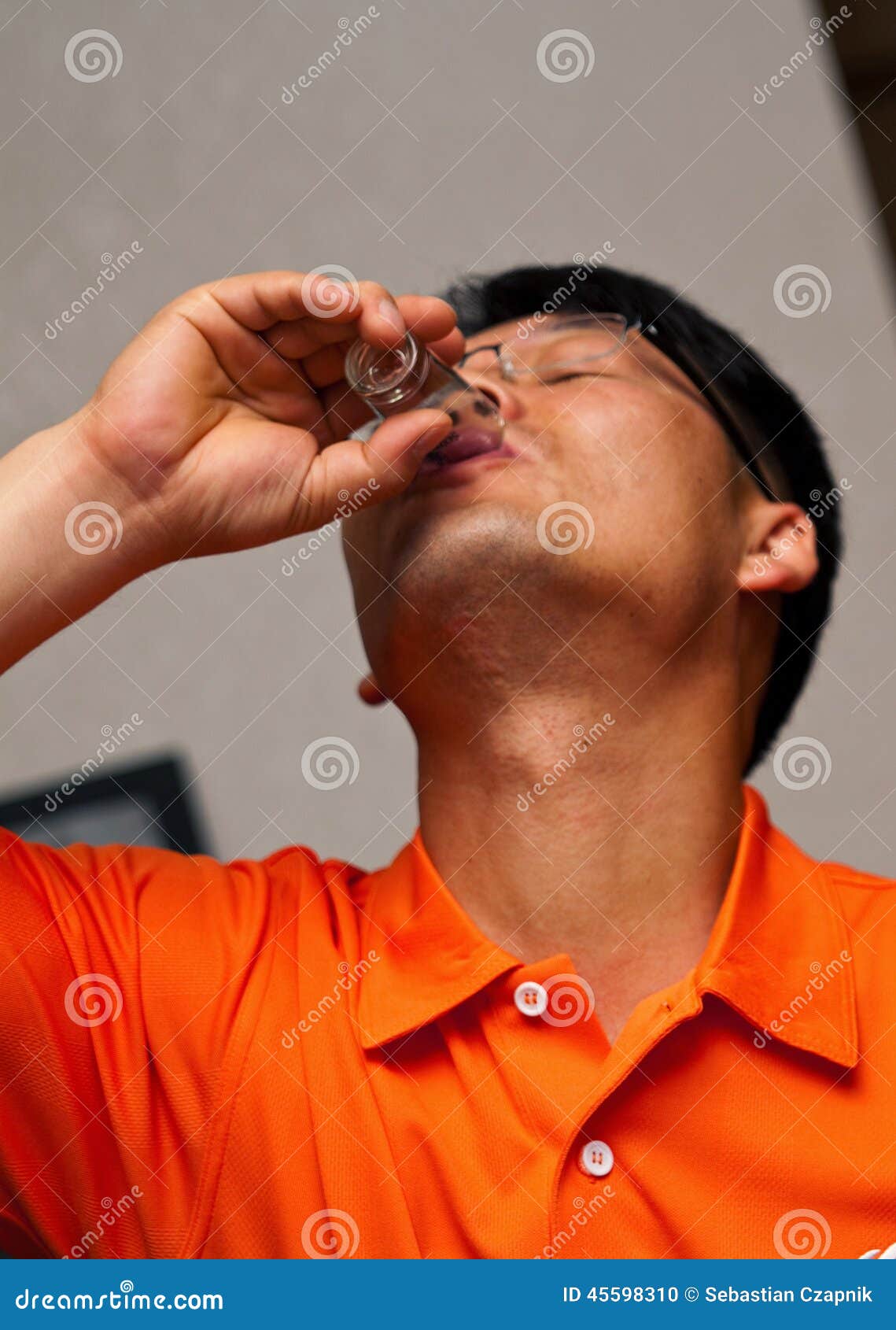 Asian man drinking vodka stock photo. Image of food, restaurant - 45598310