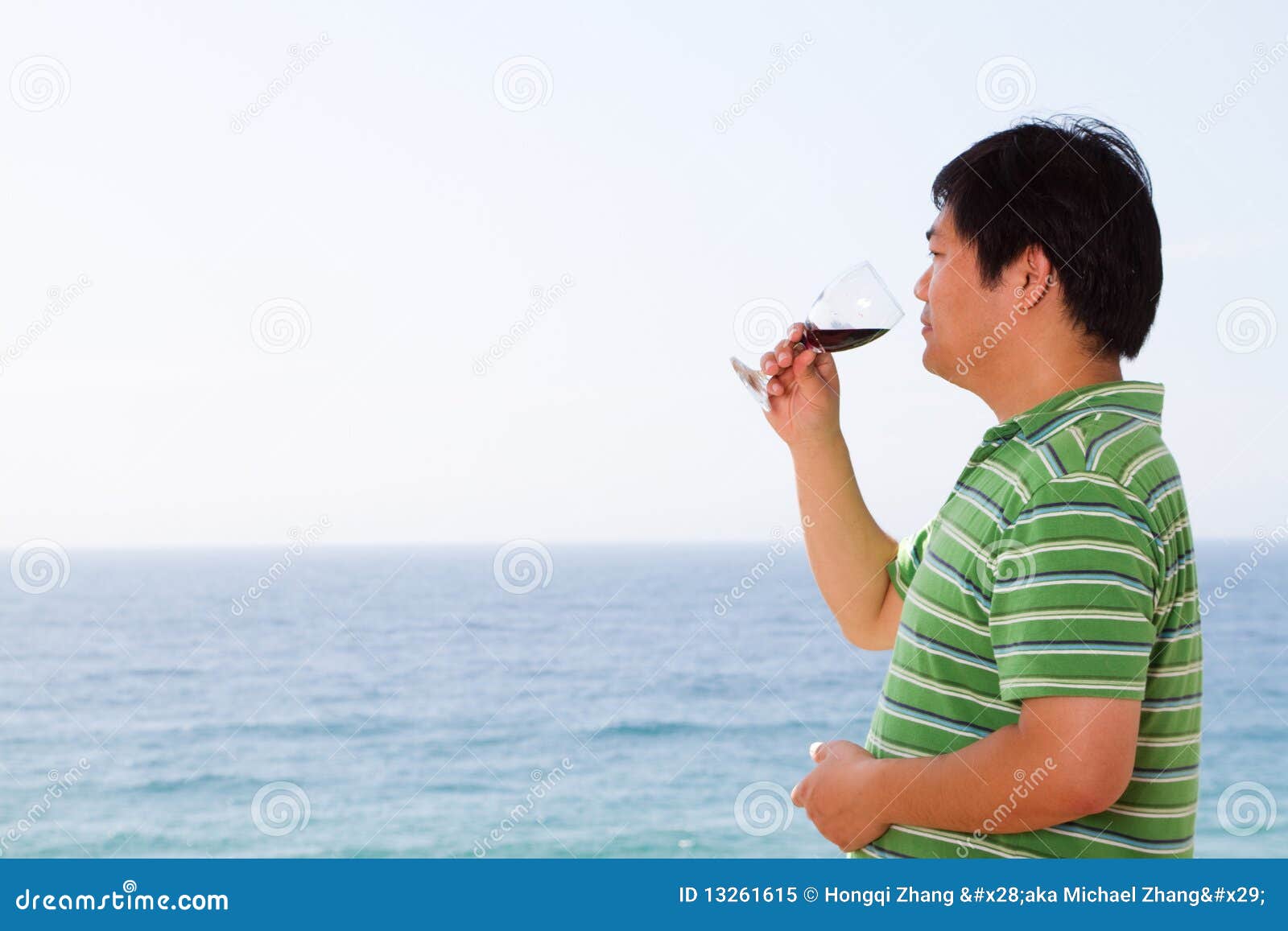 Asian man drinking wine stock image. Image of nature - 13261615