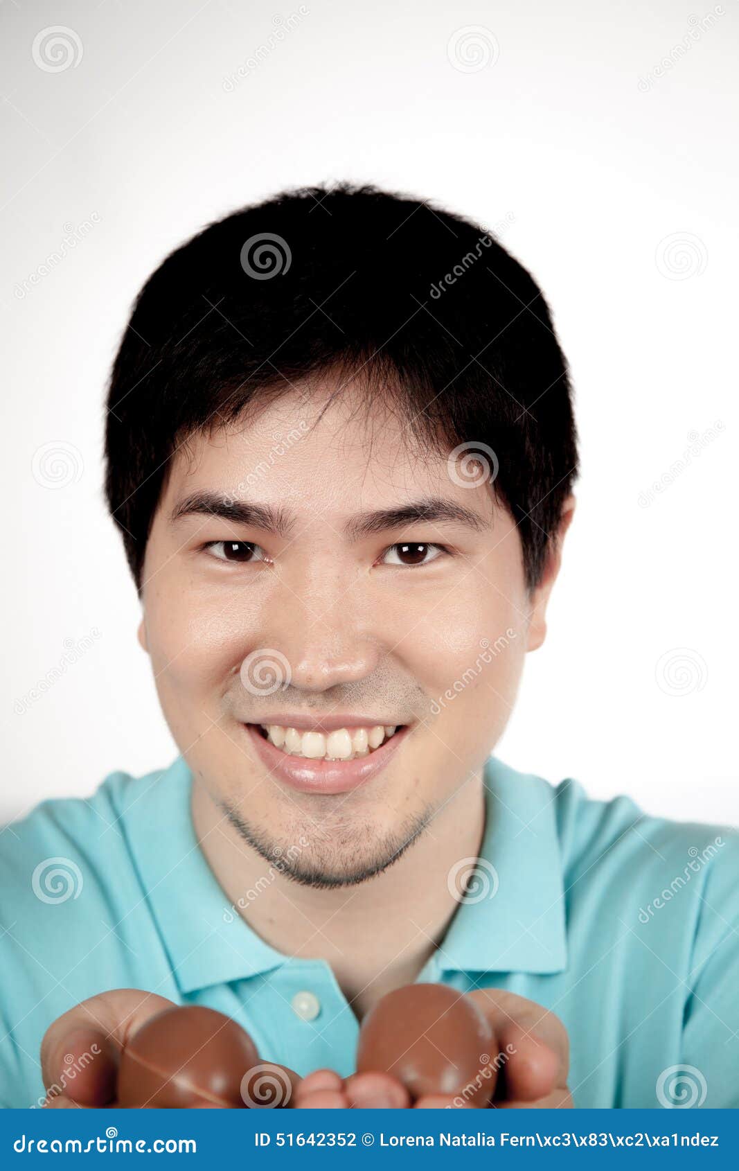 Asian man with easter eggs stock photo. Image of giving - 51642352