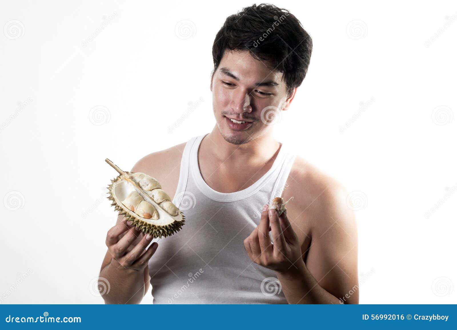 Asian man eating Durian stock photo. Image of ripe, devour - 56992016