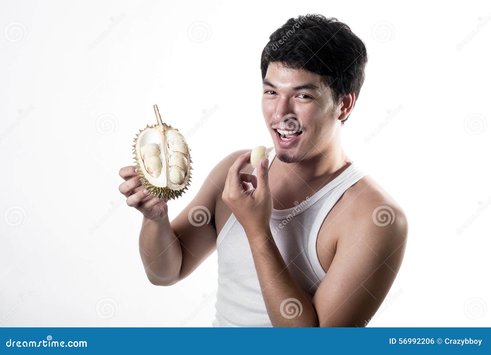 Asian man eating Durian stock photo. Image of nature - 56992206