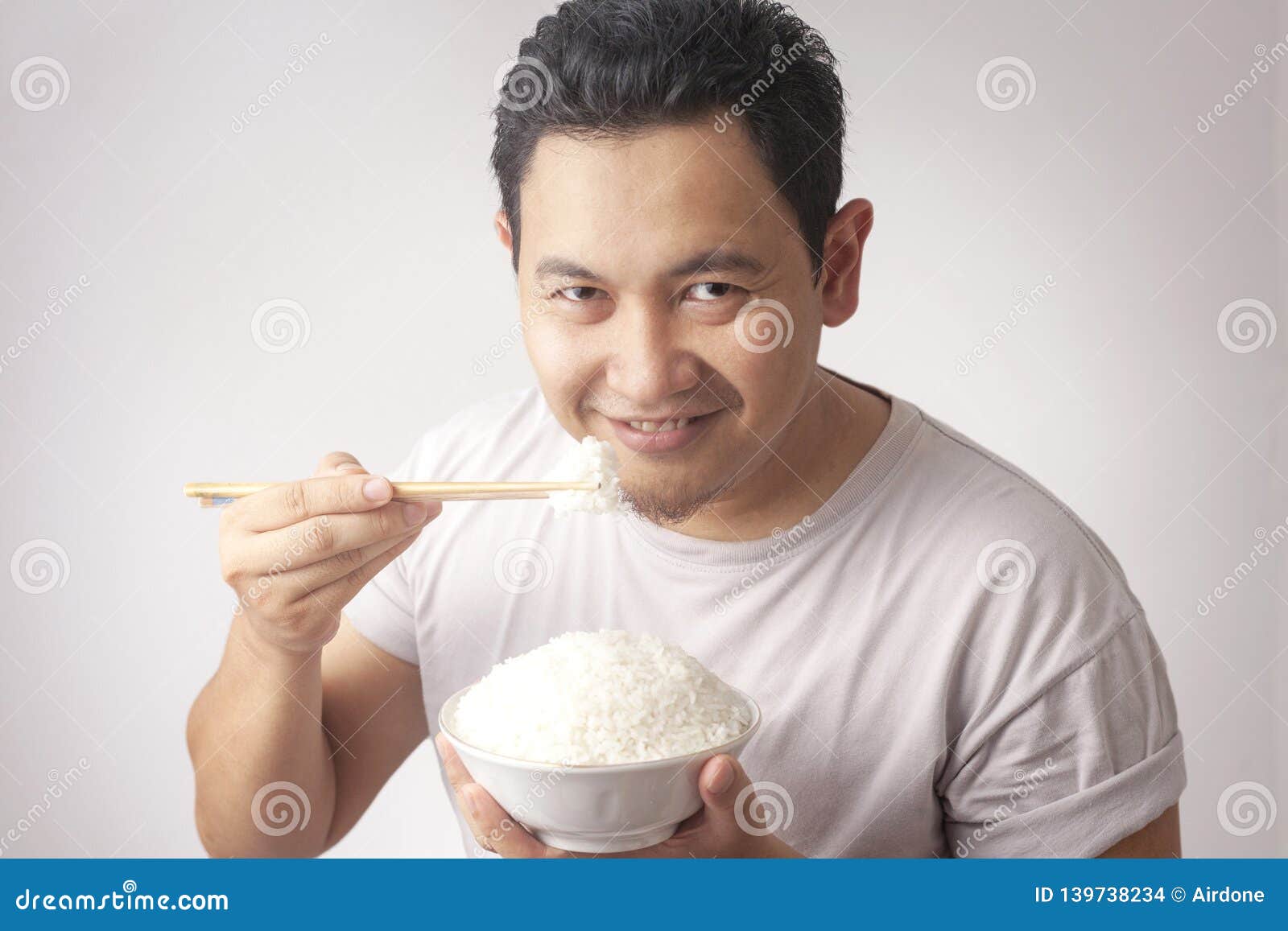 Asian Man Eating Telegraph