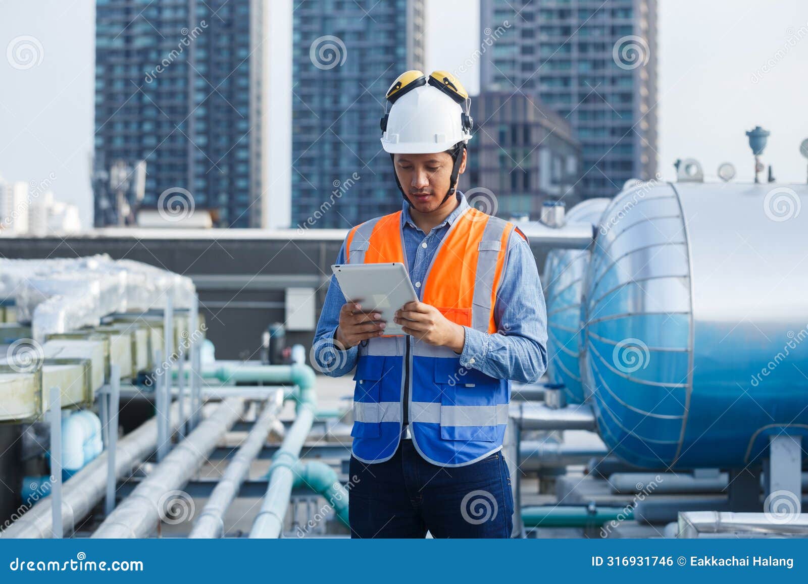 Asian Man Engineer Holding Tablet Working at Rooftop Building ...
