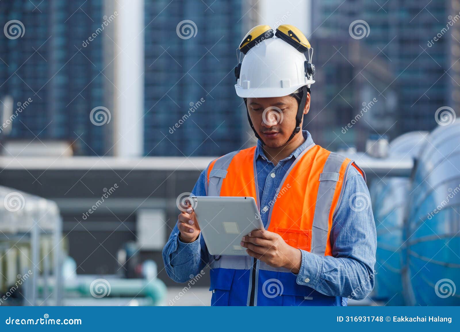 Asian Man Engineer Holding Tablet Working at Rooftop Building ...