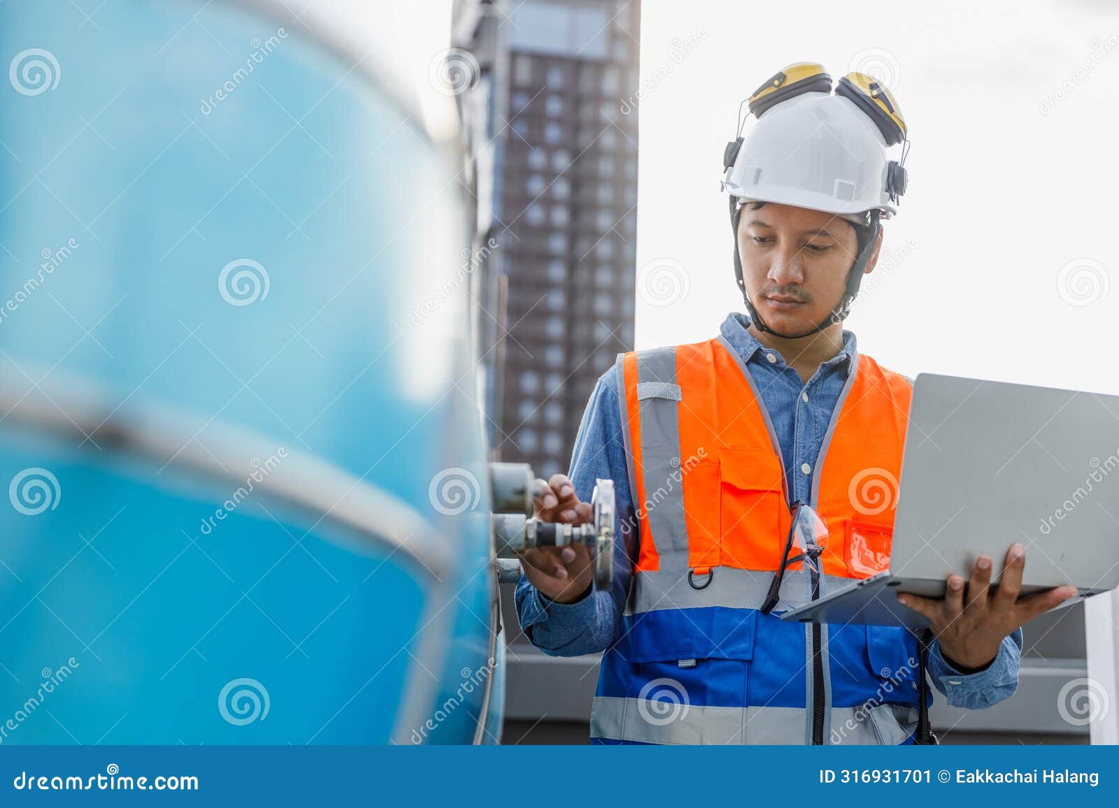 Asian Man Engineer Using Laptop Checking Valve Working at Rooftop ...