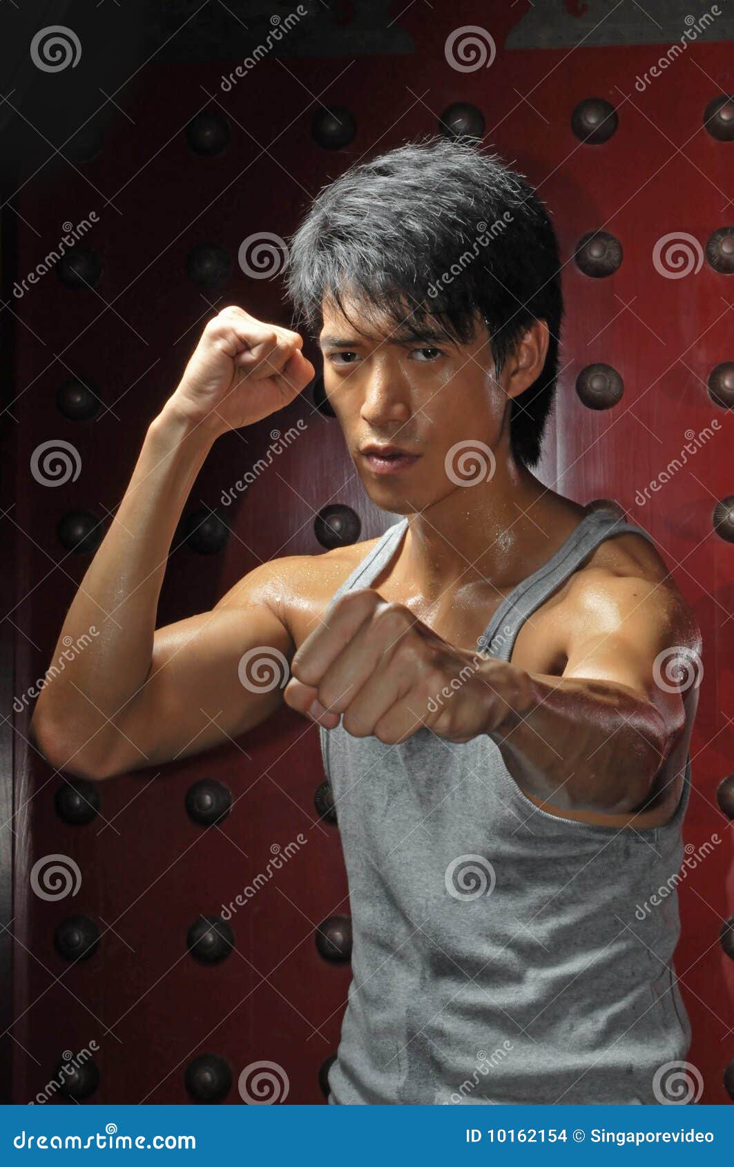 Asian Man in Fighting Action Stock Photo - Image of asia, asian: 10162154