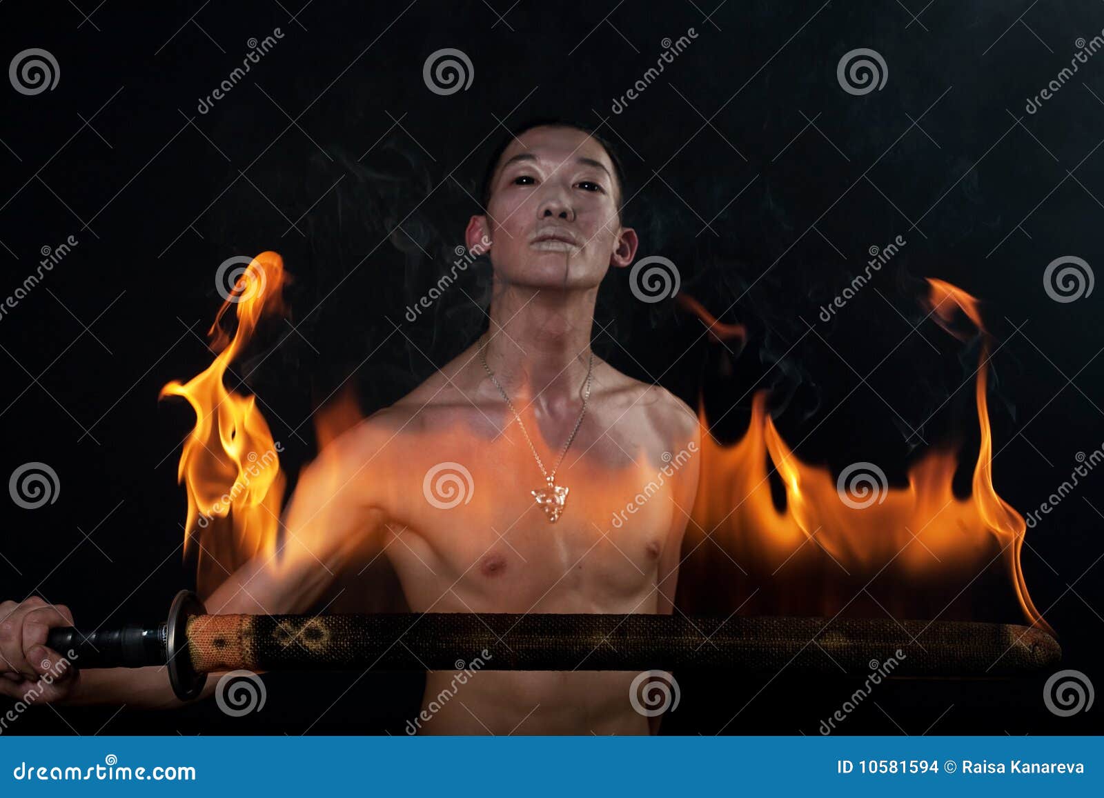 Asian man with fire show stock photo. Image of night - 10581594