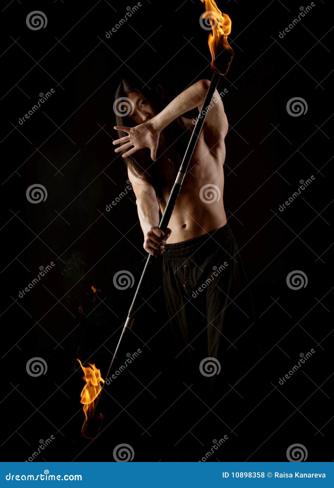 Asian man with fire show stock photo. Image of fire, breath - 10898358