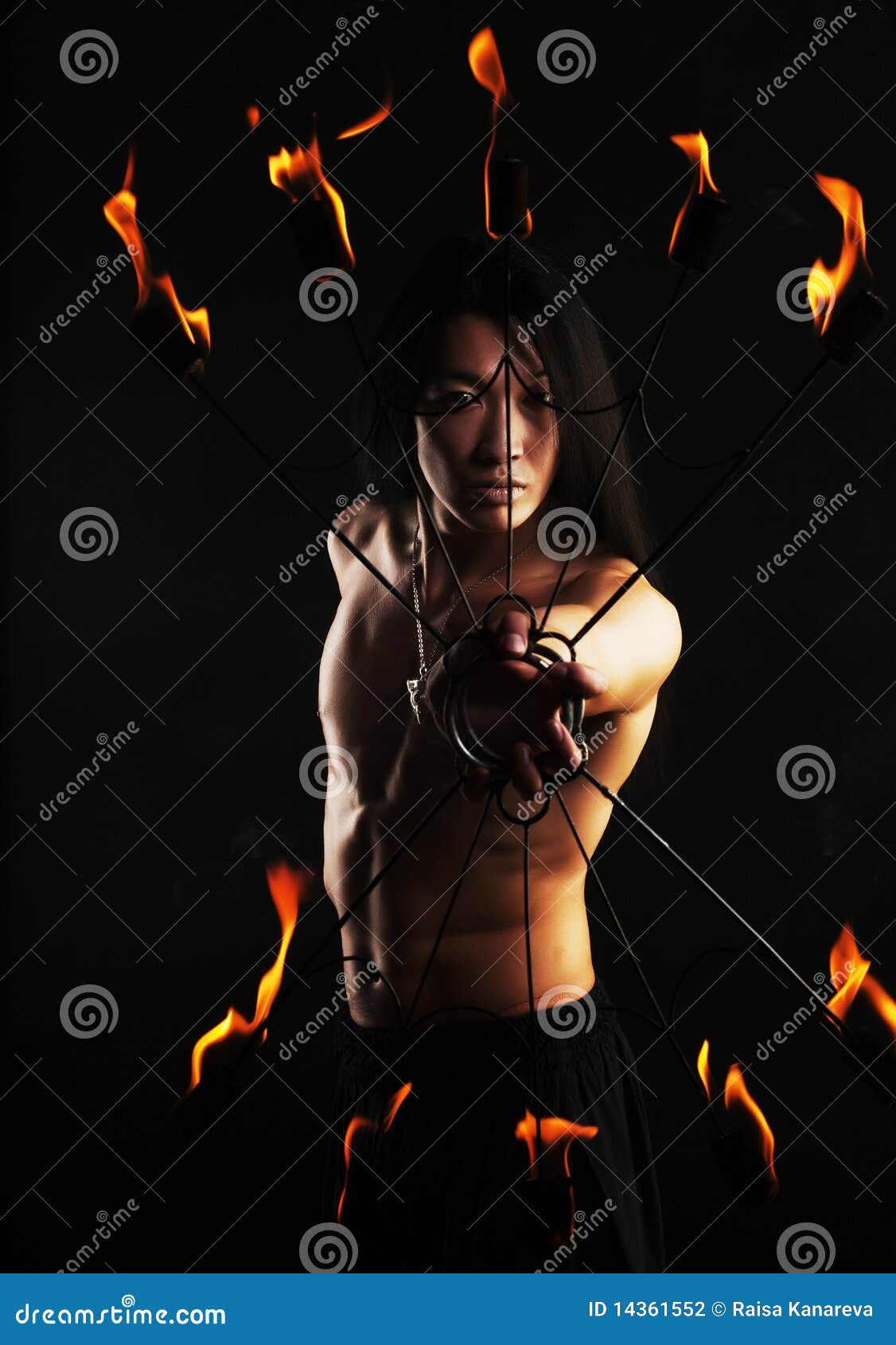 Asian man with fire show stock photo. Image of flaming - 14361552